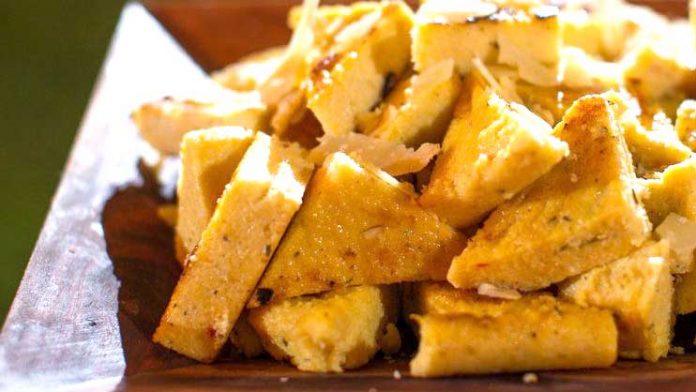 Polenta Triangles With Parmesan Cheese Recipe - RecipeMatic